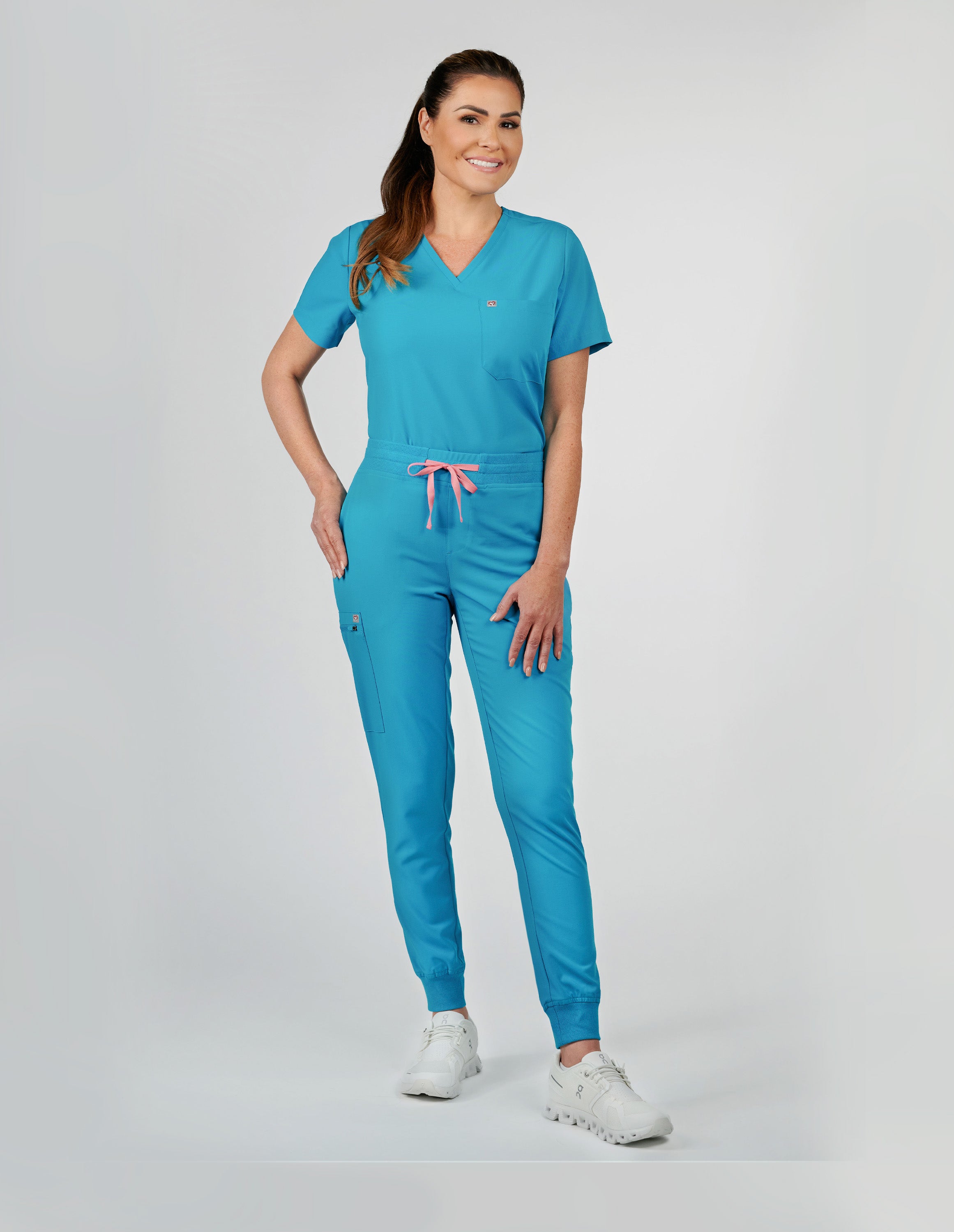 Rose One-Pocket Womens Caribbean Blue Scrub Top – Create Amor